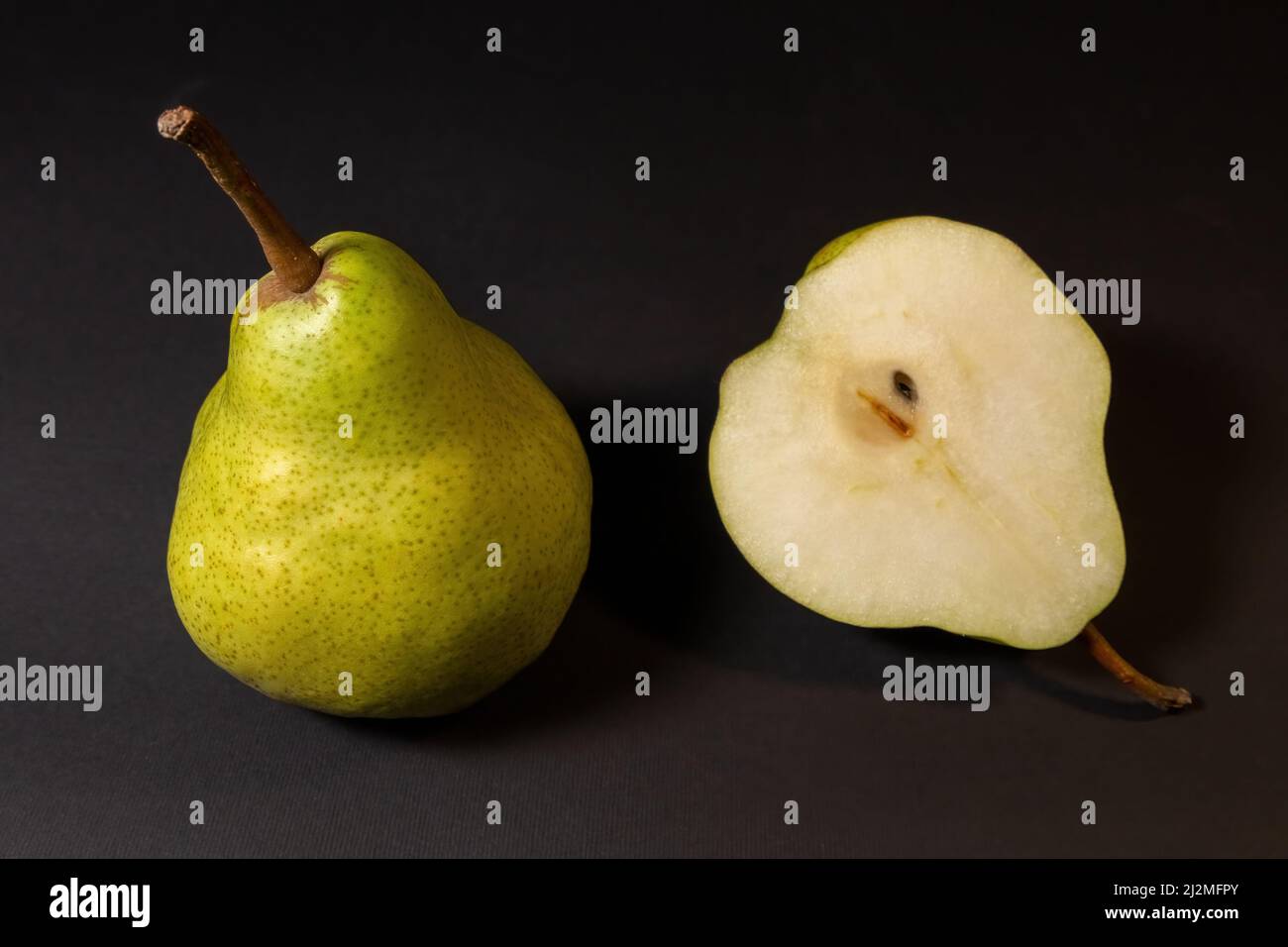 Pear cut in half hi-res stock photography and images - Alamy
