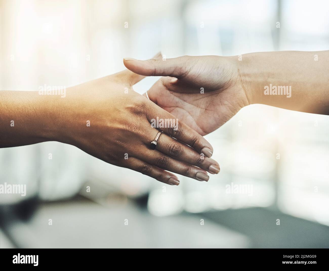 Shake to the agreement. Closeup shot of two unrecognizable ...