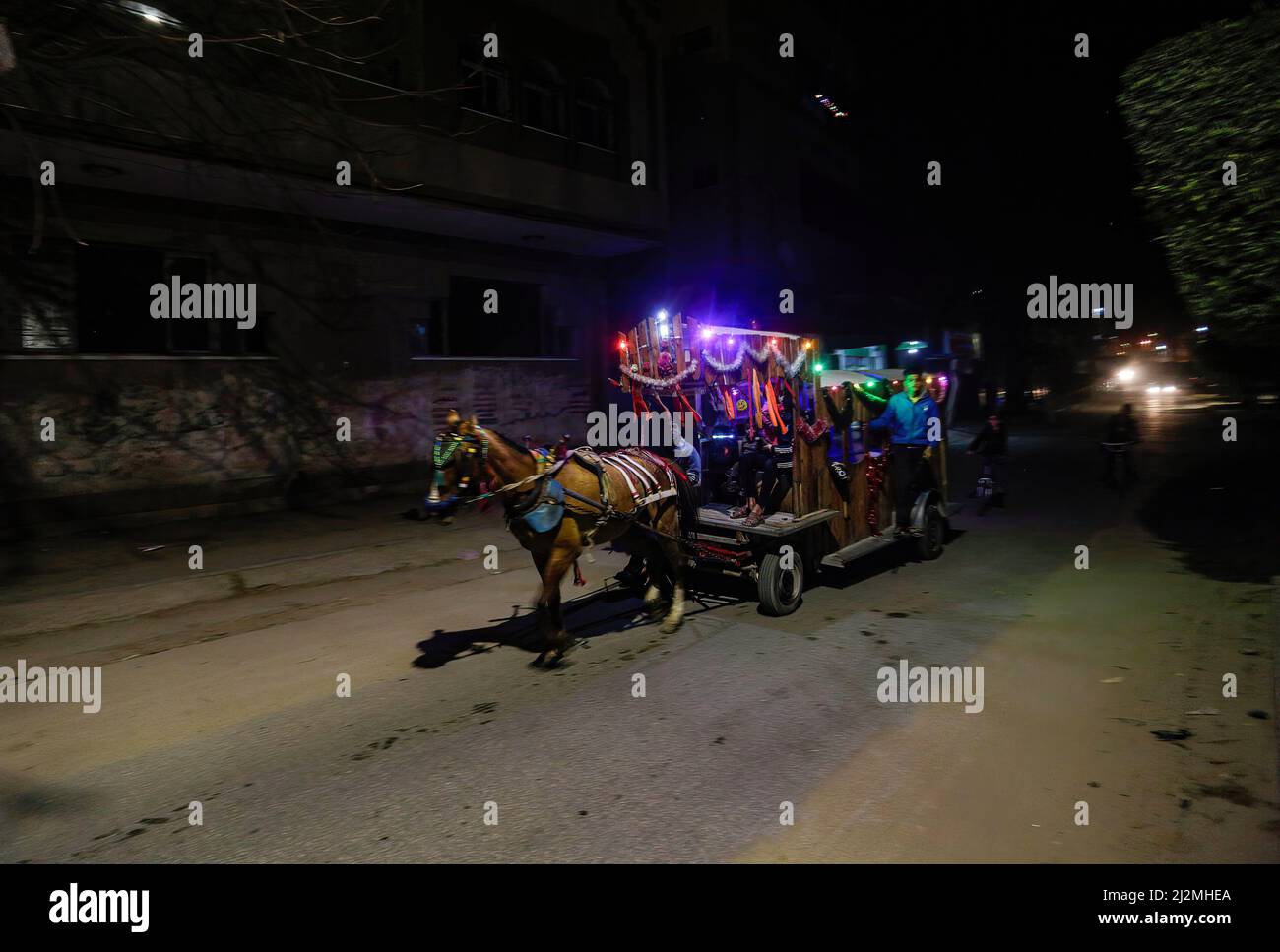 Palestinian children ride a horse cart during the celebrations for the ...