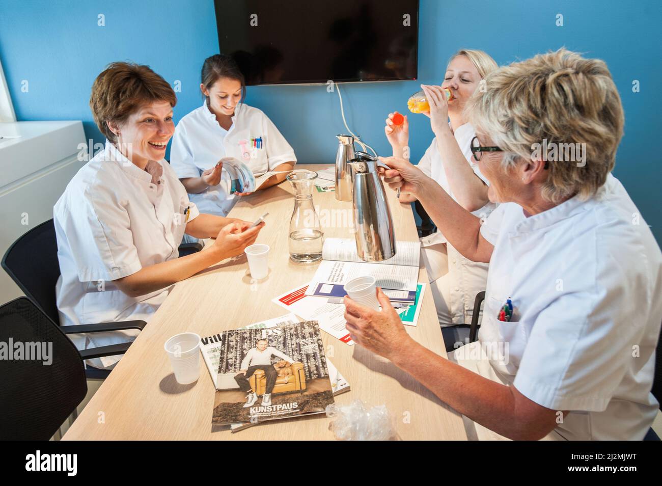 Nurses taking a break Stock Photo - Alamy