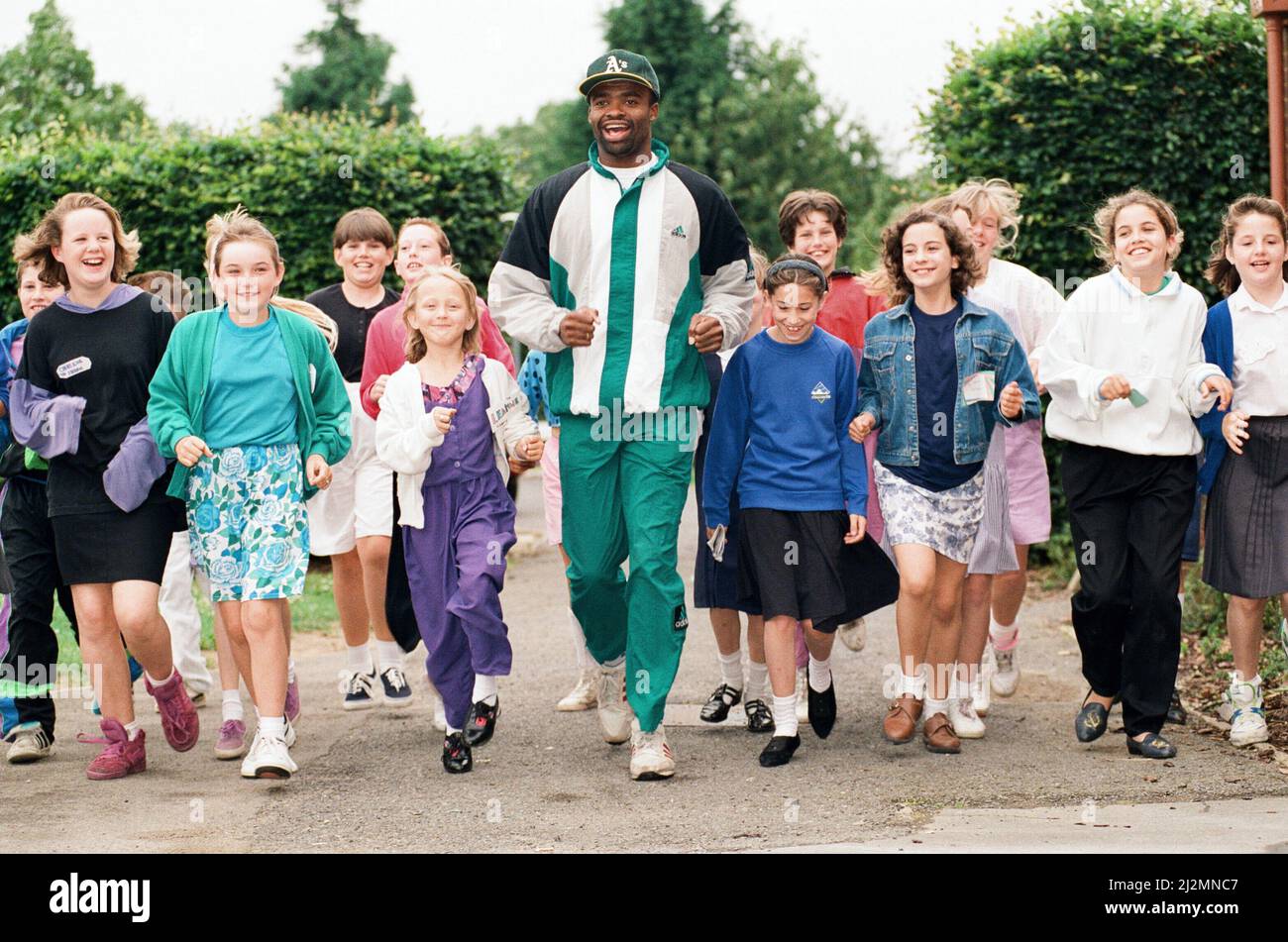 Kriss Akabusi at Geoffrey Field School, Reading. 8th July 1991 Stock ...