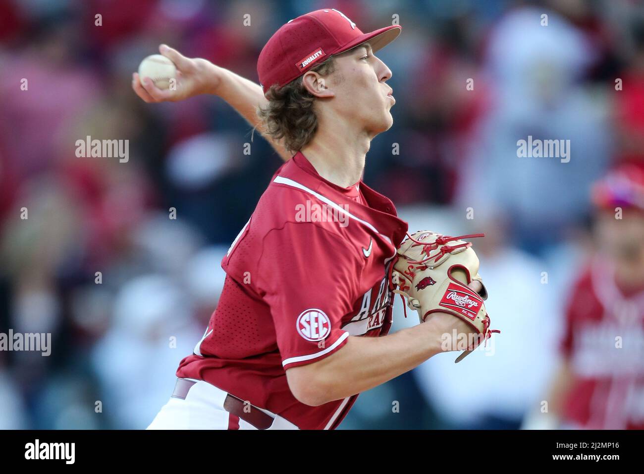 April 2, 2022: Hagen Smith #33 Arkansas pitcher delivers a pitch from the mound. Arkansas ...