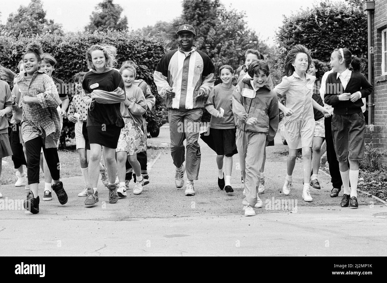 Kriss Akabusi at Geoffrey Field School, Reading. 8th July 1991 Stock ...
