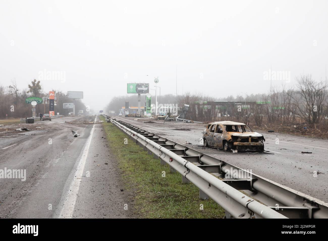 Bucha, Ukraine. 02nd Apr, 2022. A destroyed car seen on a highway 20km ...
