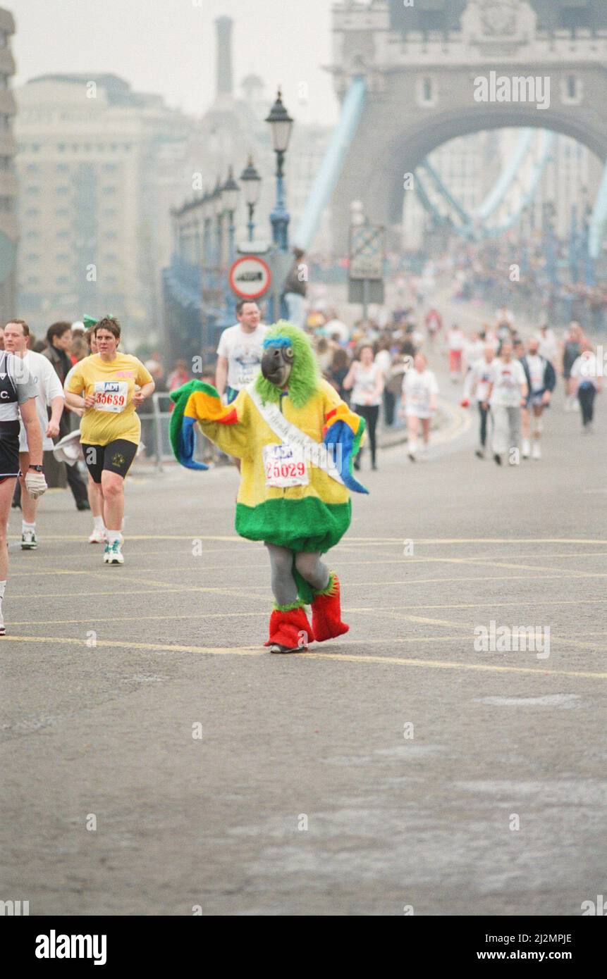 The London Marathon - 1990Runners pass through and around the Tower ...