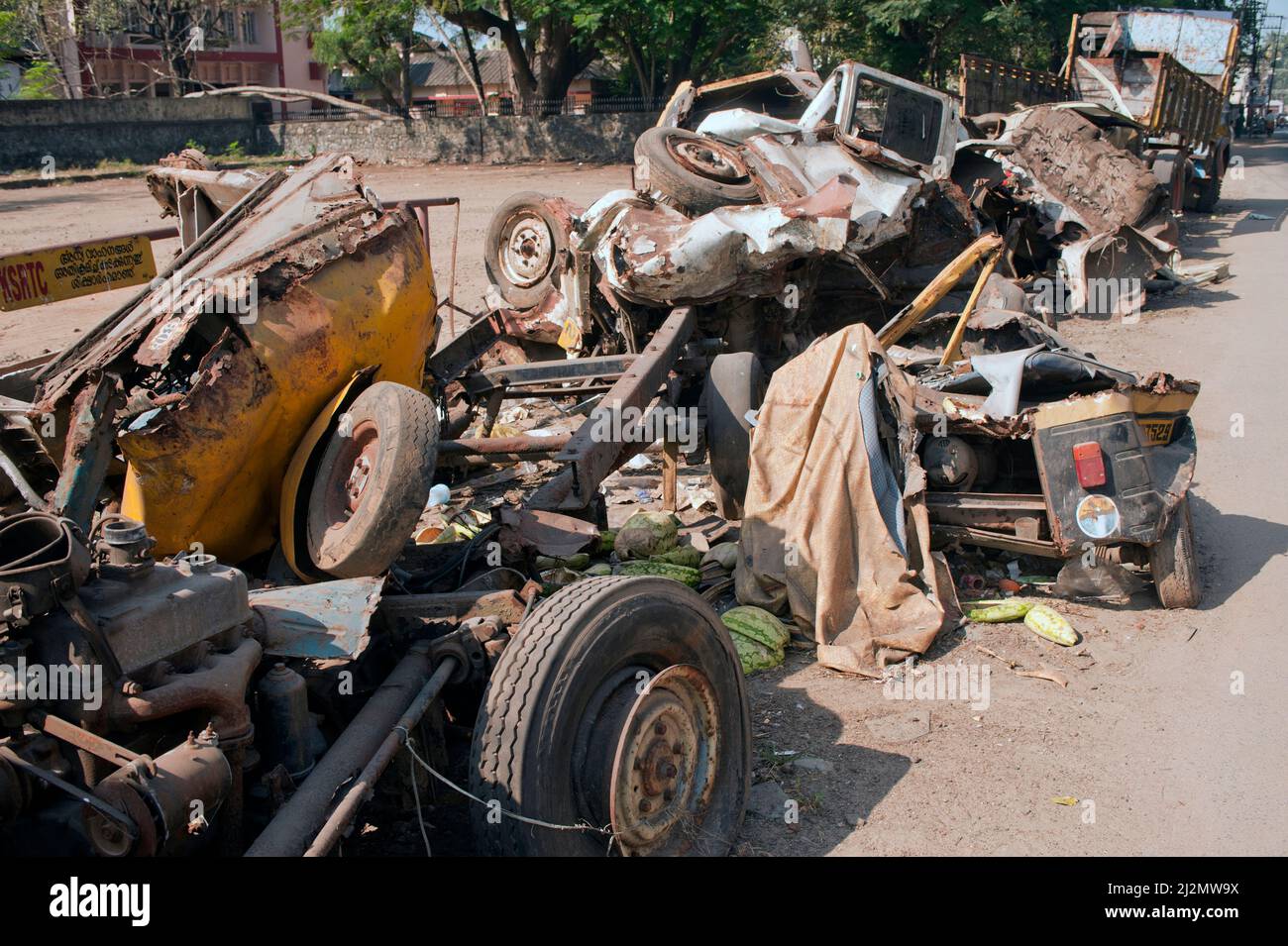 Scrap vehicles garbage greets on road at Thiruvananthapuram state ...