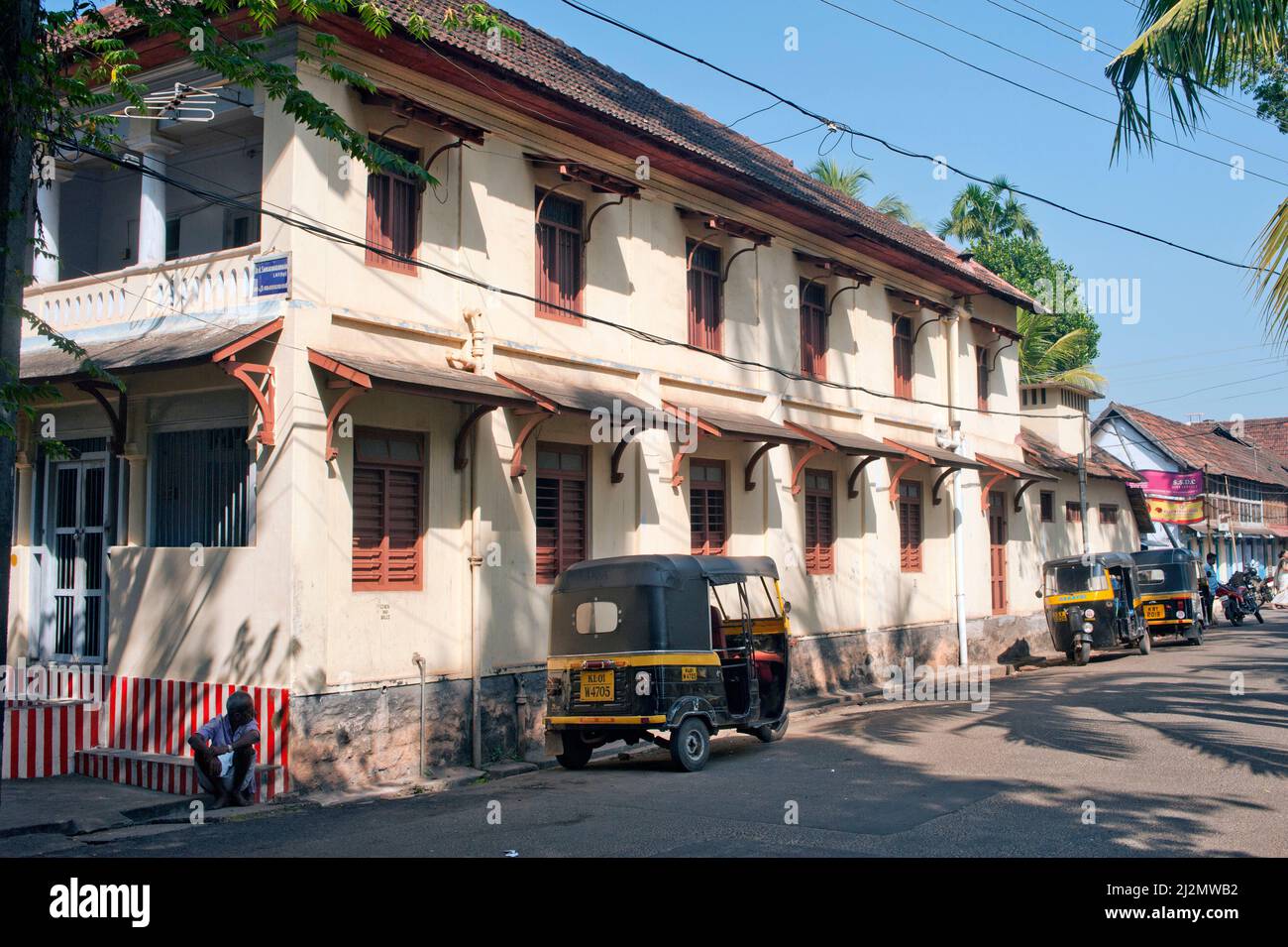 Traditional architectural tiled roof building of city ...