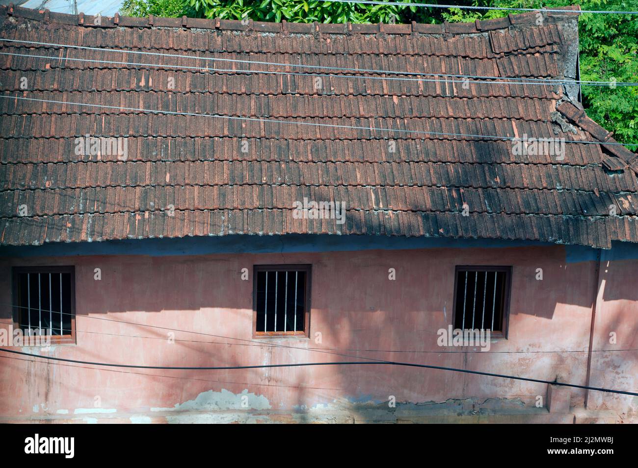 Traditional architectural tiled roof building of city ...