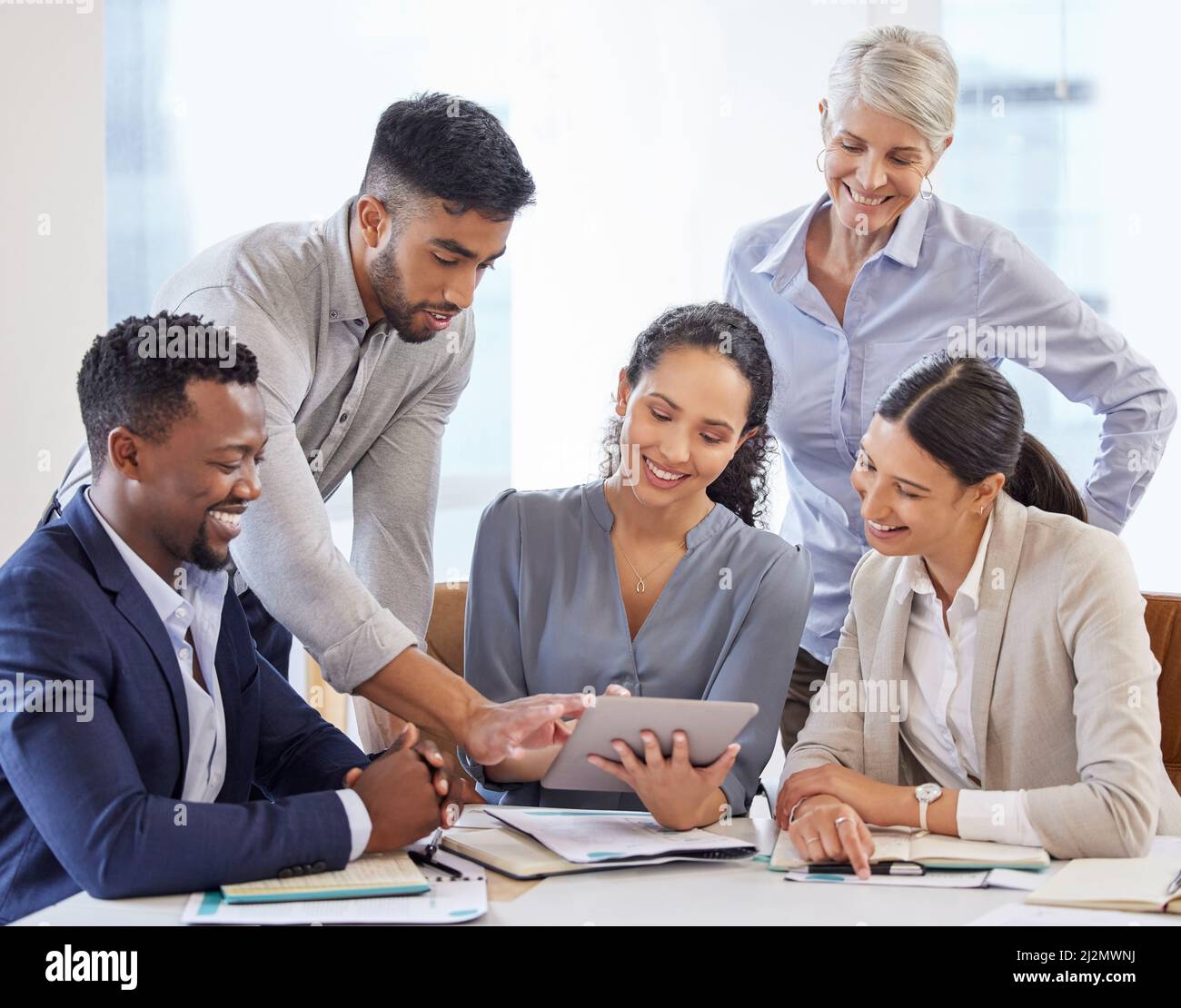 Collaboration is everything. Shot of a group of businesspeople ...