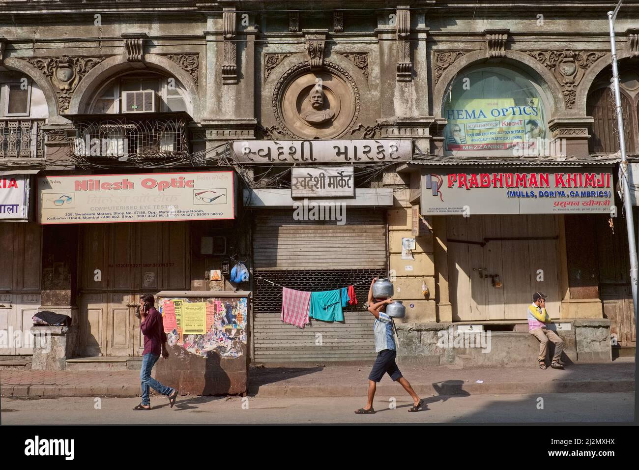 Morning view of trading street Kalbadevi Rd, Mumbai, India, with a ...