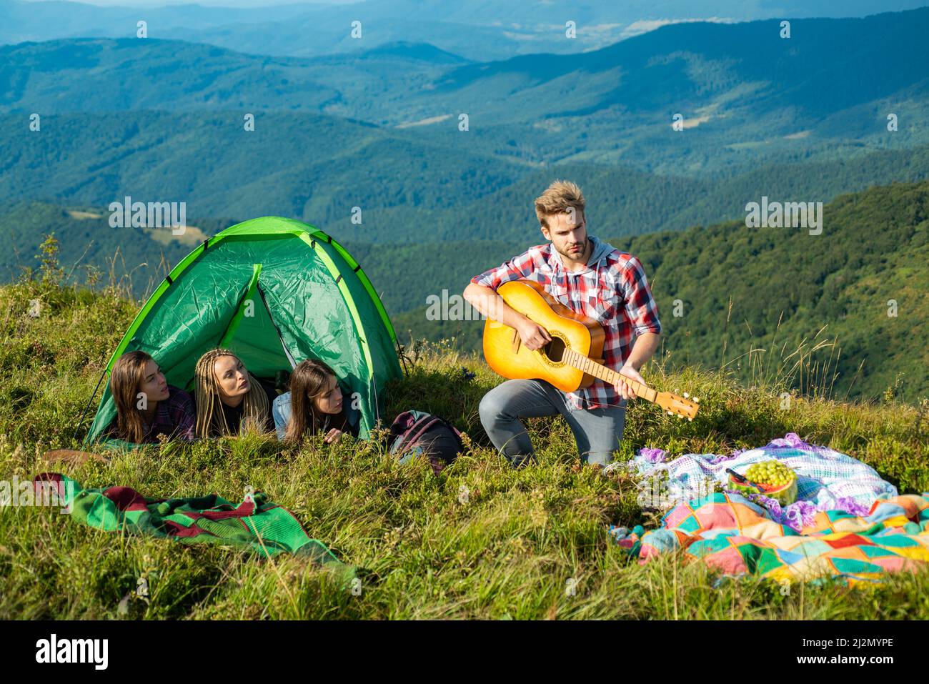 Camping together is fun, friendship romantic picnic in tourism camp ...