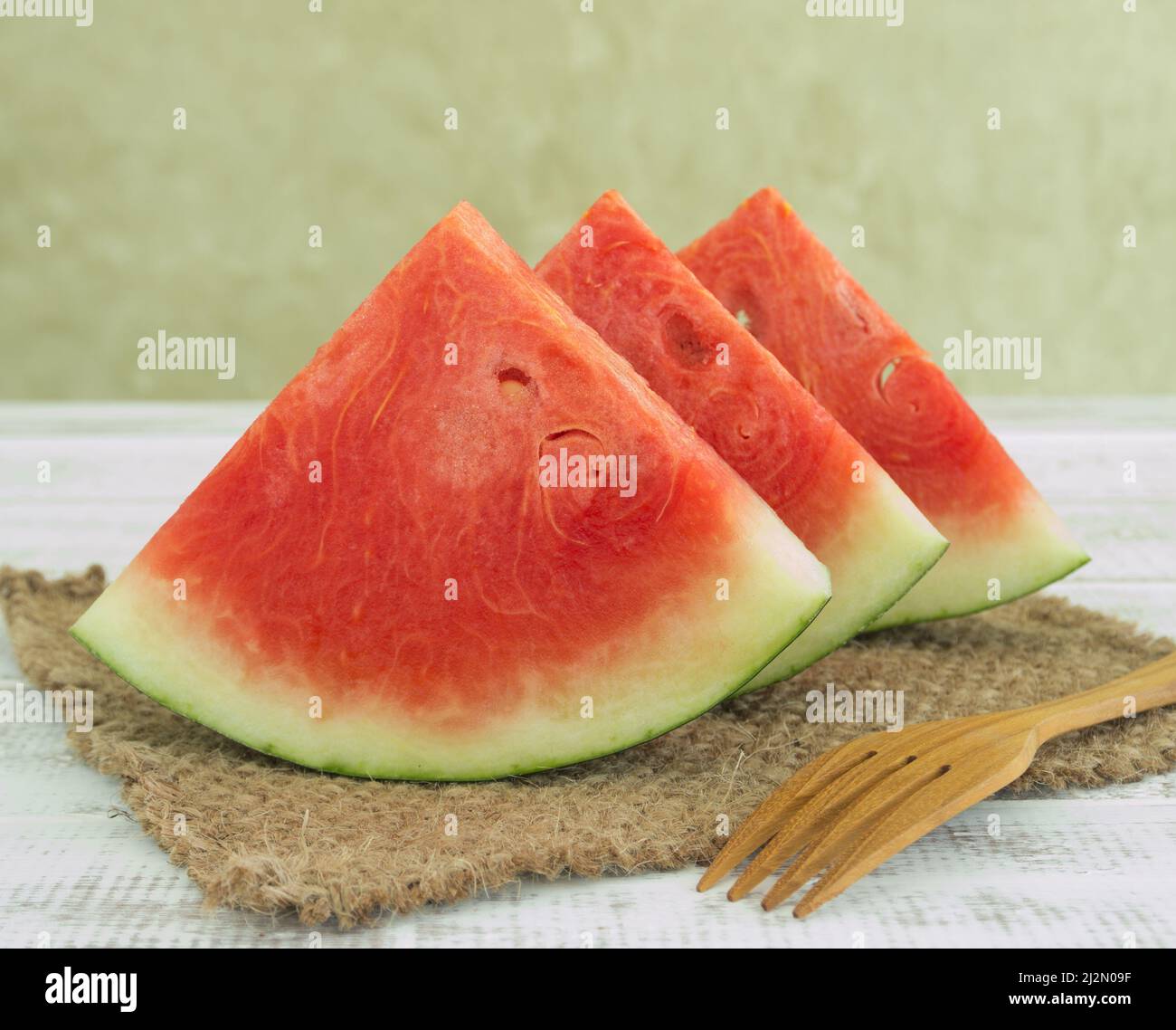 Watermelon slice in natural light Stock Photo - Alamy