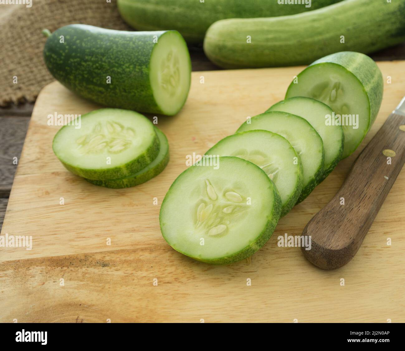 cucumber and cucumber slice on wood block. for cook Stock Photo - Alamy