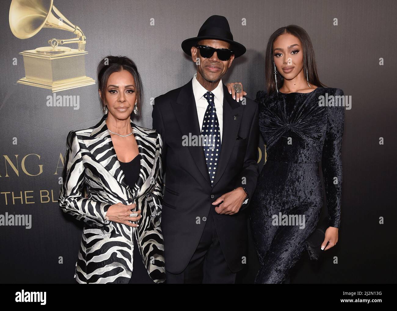 Lisa Harris, Jimmy Jam and Bella Harris walking on the red carpet at ...