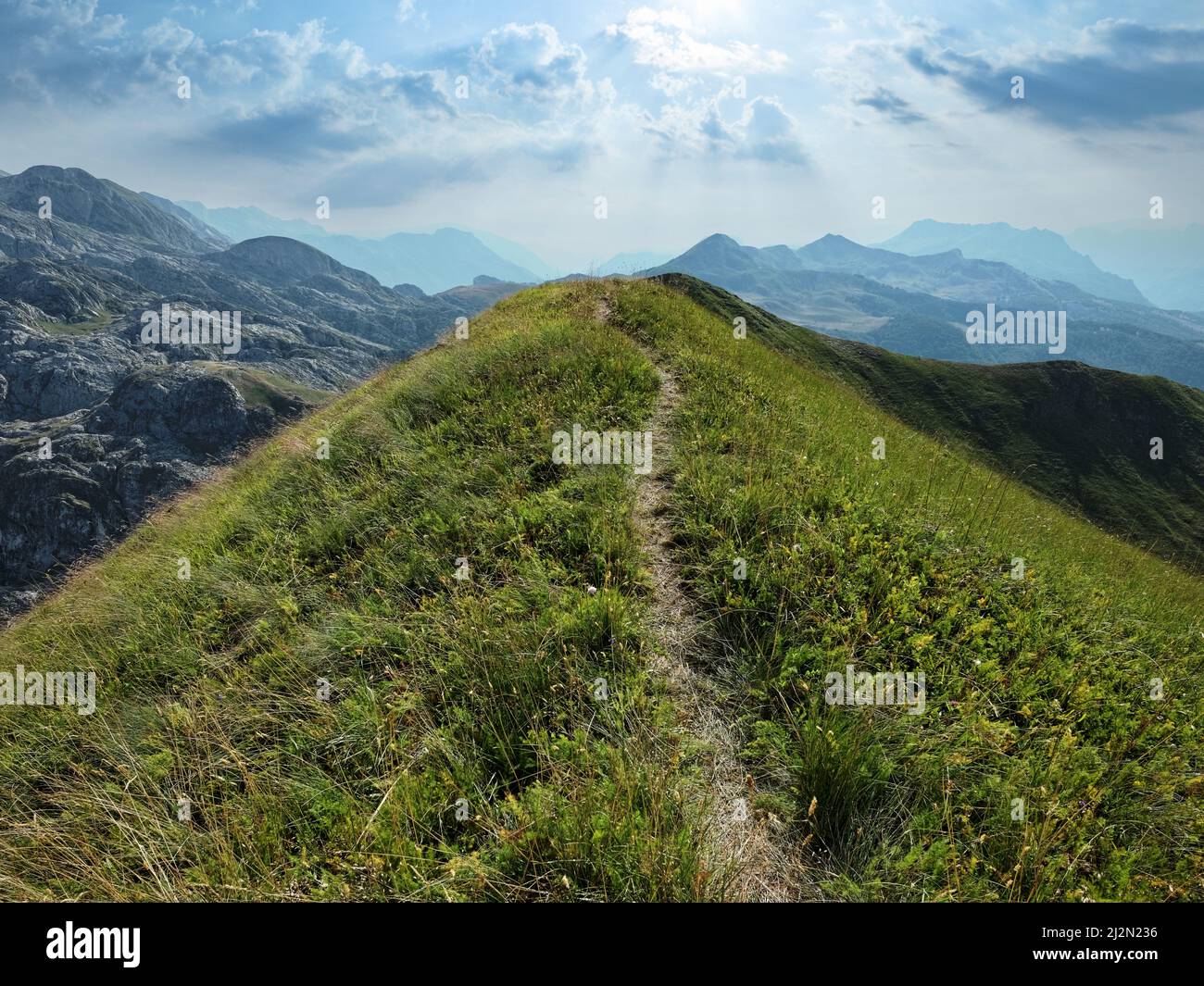 mountain footpath to the sky on mountain ridge of Prokletije Park in ...