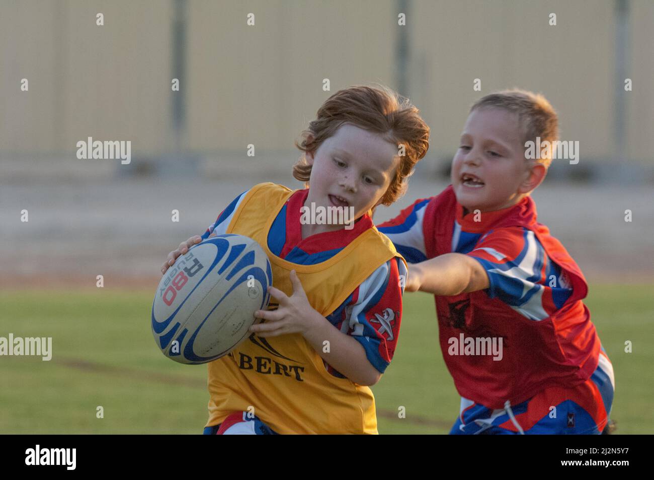 young kids playing rugby Stock Photo - Alamy