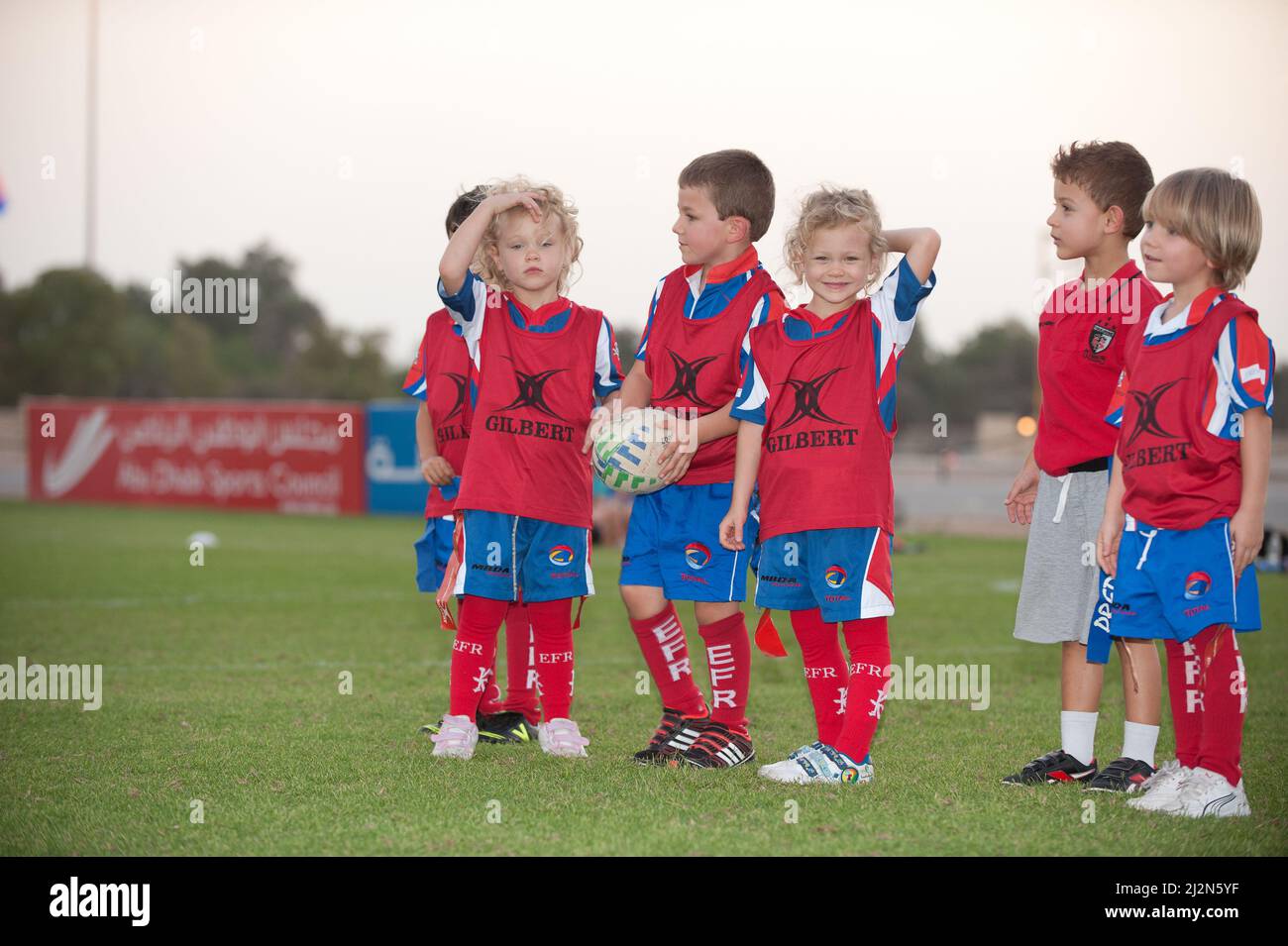 young kids playing rugby Stock Photo - Alamy