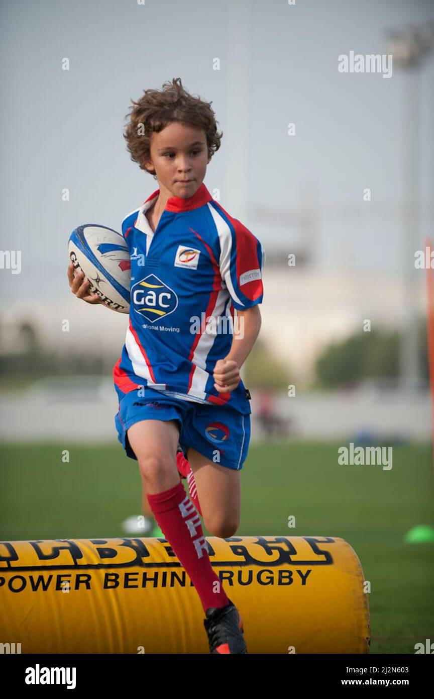 young kids playing rugby Stock Photo - Alamy