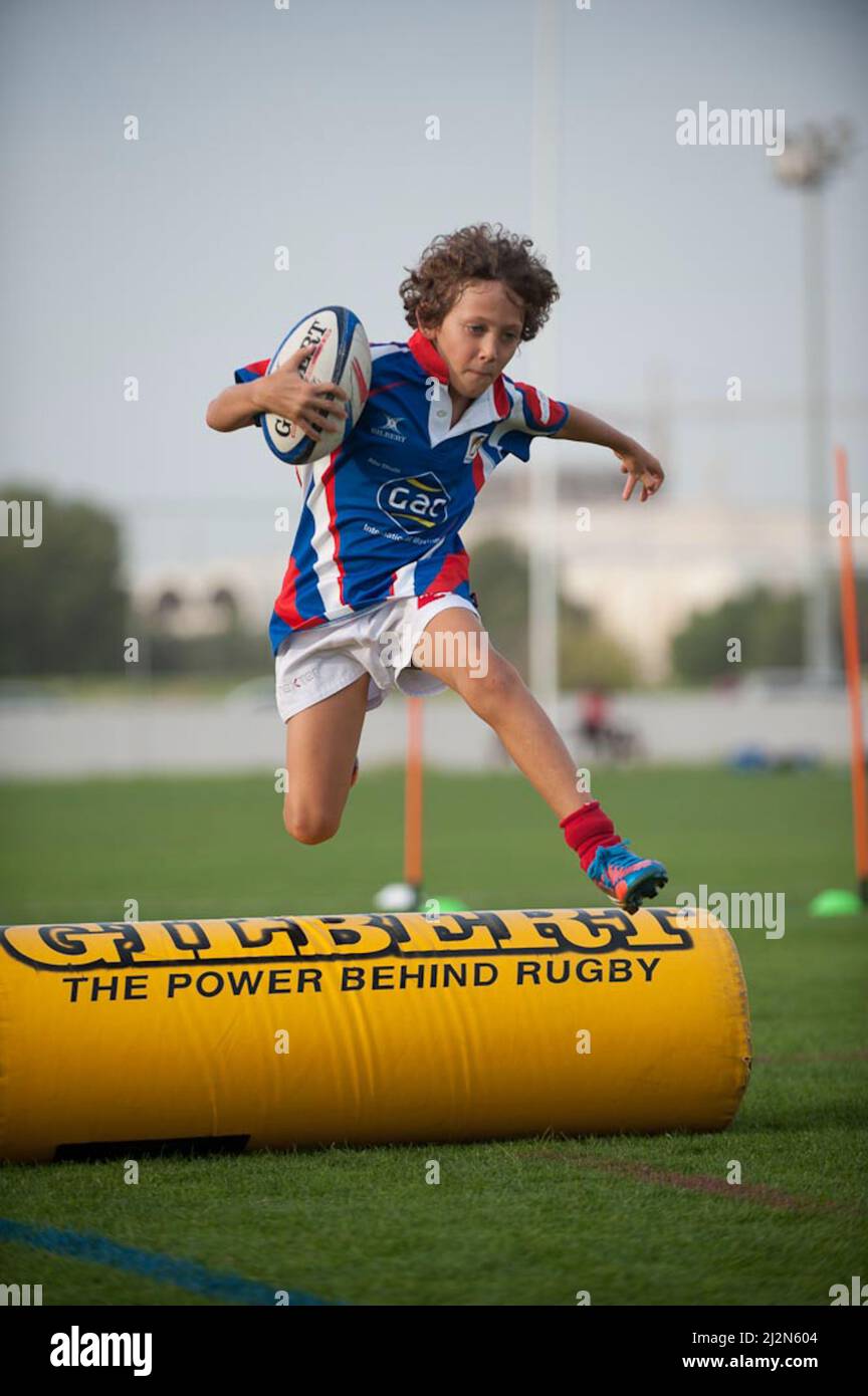 young kids playing rugby Stock Photo - Alamy