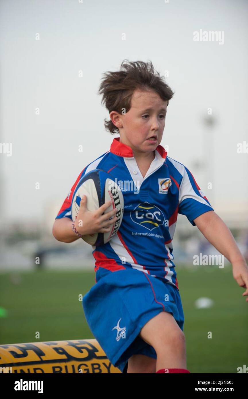 young kids playing rugby Stock Photo - Alamy