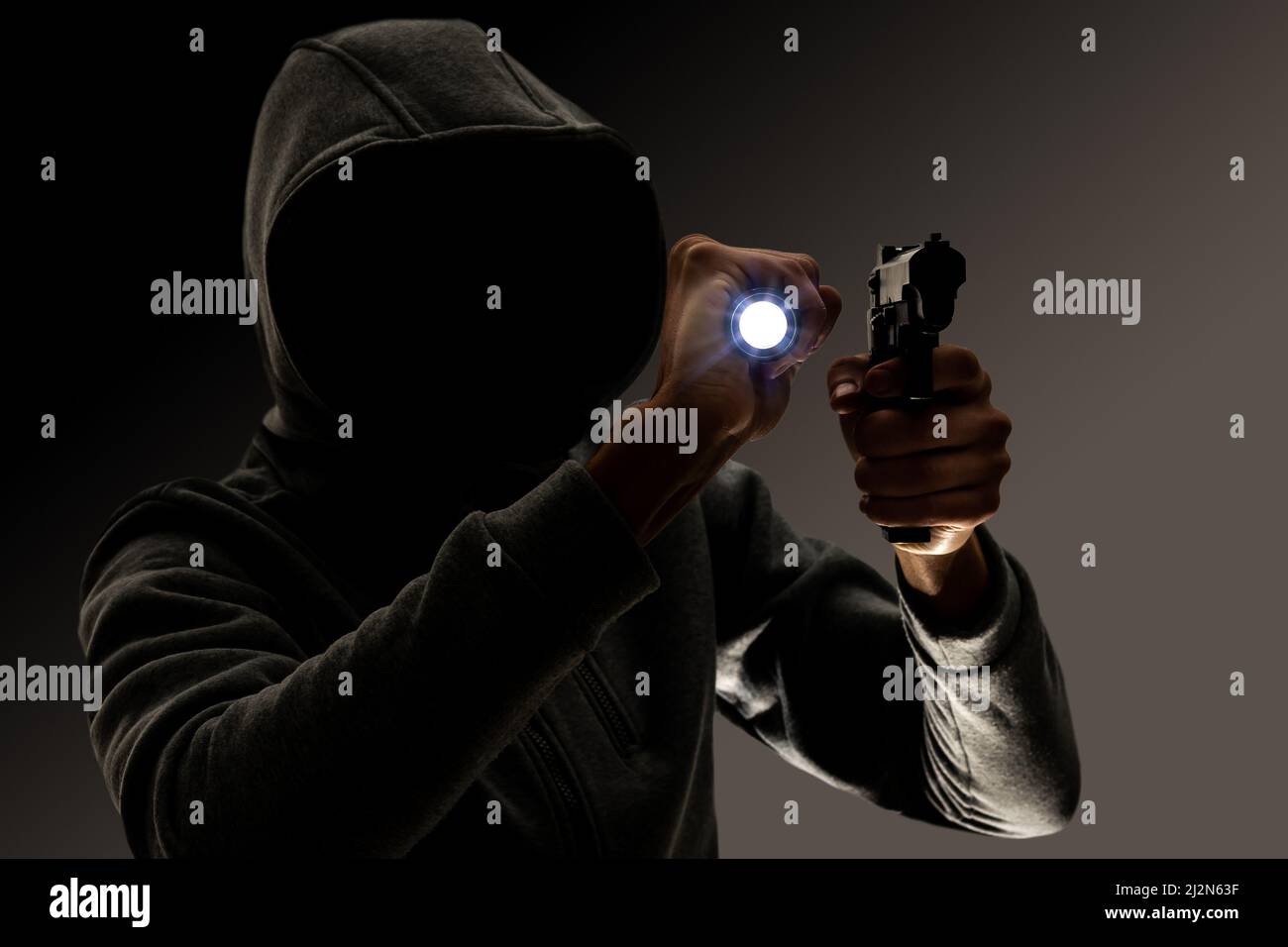 burglary and robbery. skillful professional masked burglar holding a ...