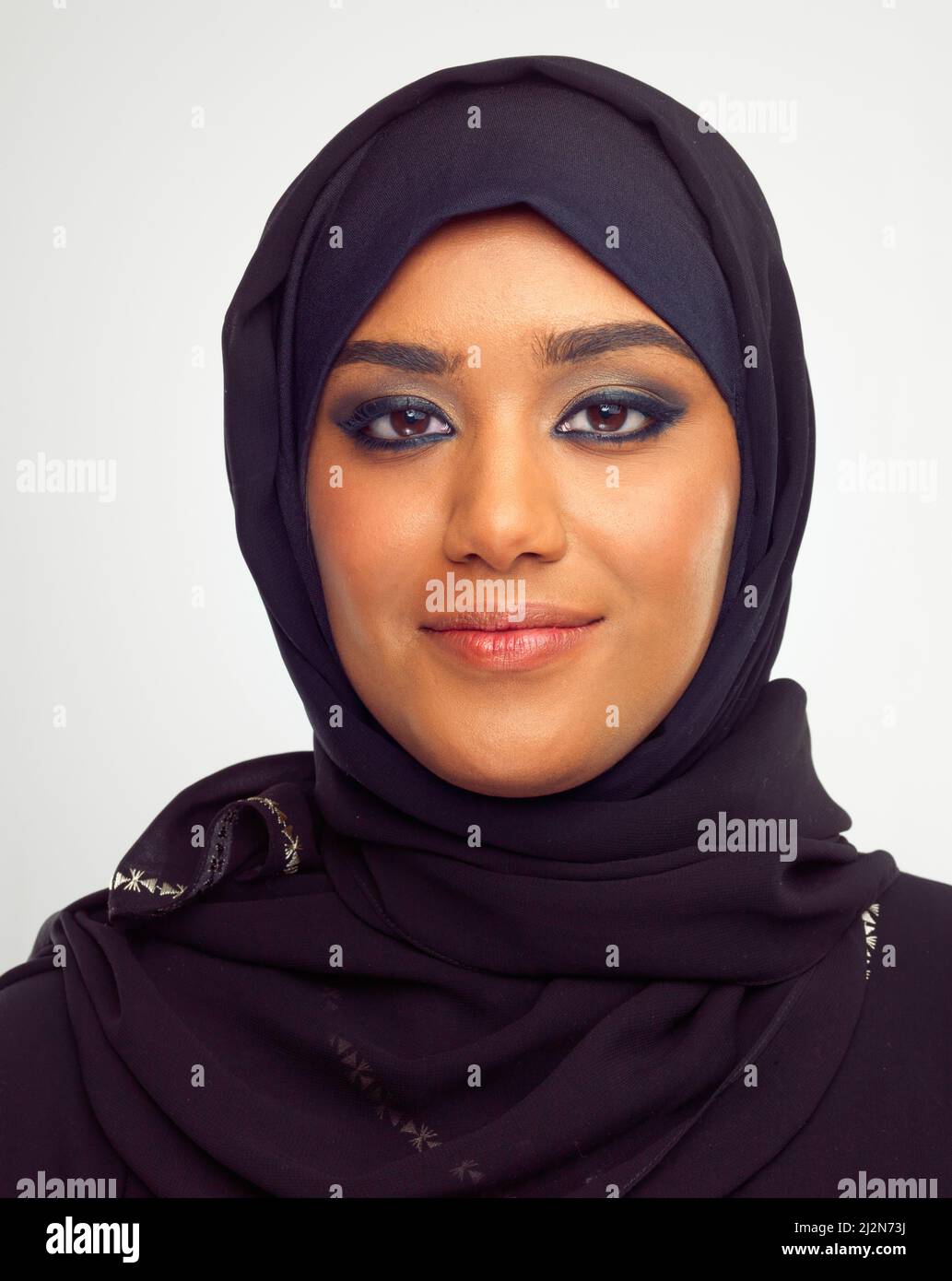 Middle-eastern beauty. Studio portrait of a young muslim woman Stock Photo - Alamy