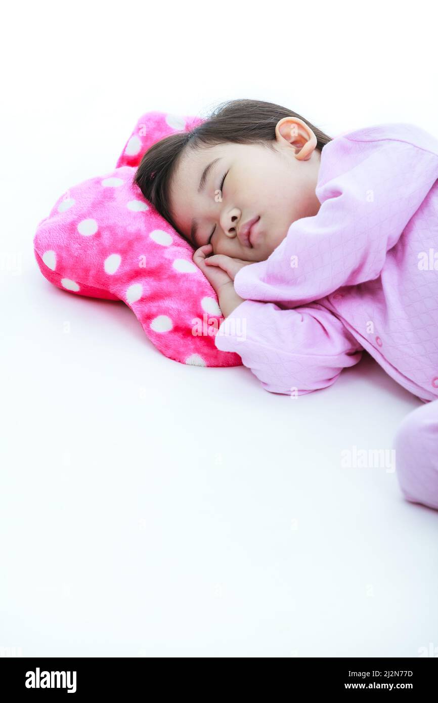 Healthy children concept. Asian child sleeping peacefully. Adorable ...