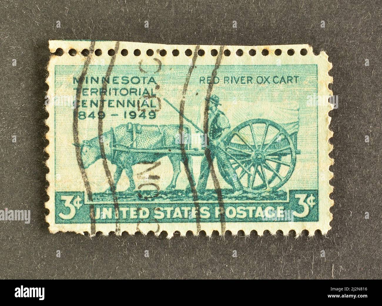 Cancelled postage stamp printed by USA, that shows Red river ox cart ...