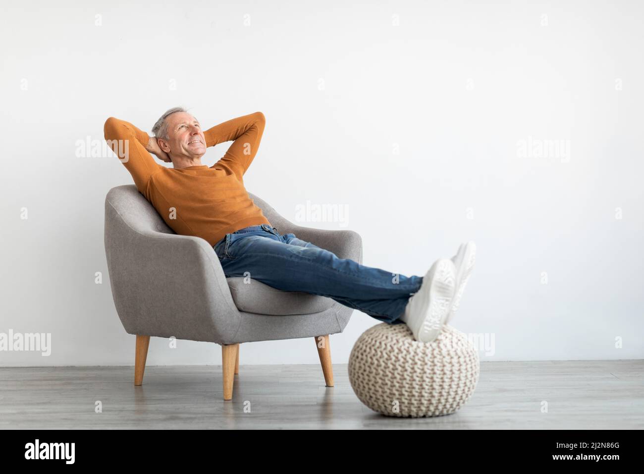 Old man chair wall hi-res stock photography and images - Alamy