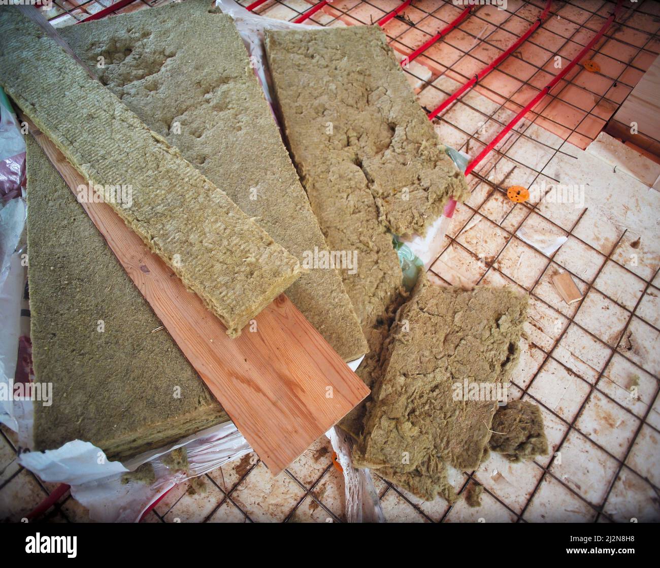 replacement of damaged insulation on a heated floor, indoshot Stock ...