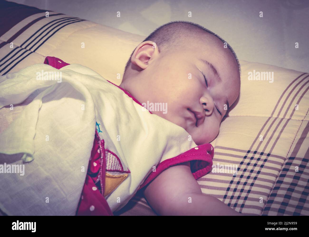 Healthy children concept. Closeup of adorable asian baby sleeping ...