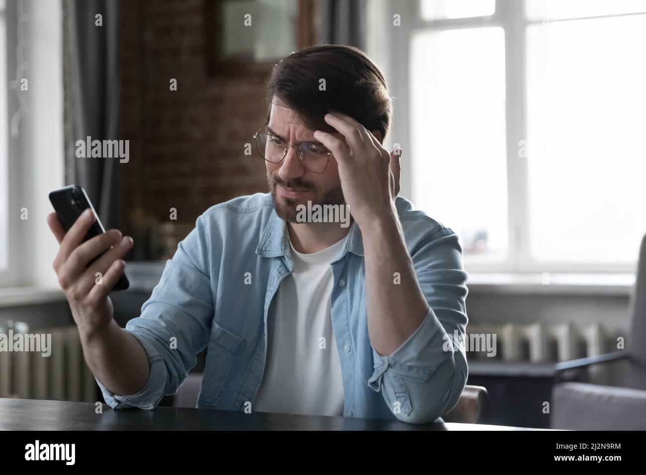 Annoyed man hi-res stock photography and images - Alamy