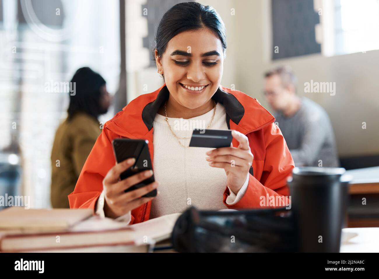 Student buying with credit card hi-res stock photography and images - Alamy
