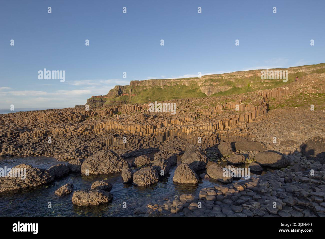 Sunset over basalt columns Giant's Causeway, County Antrim, Northern ...
