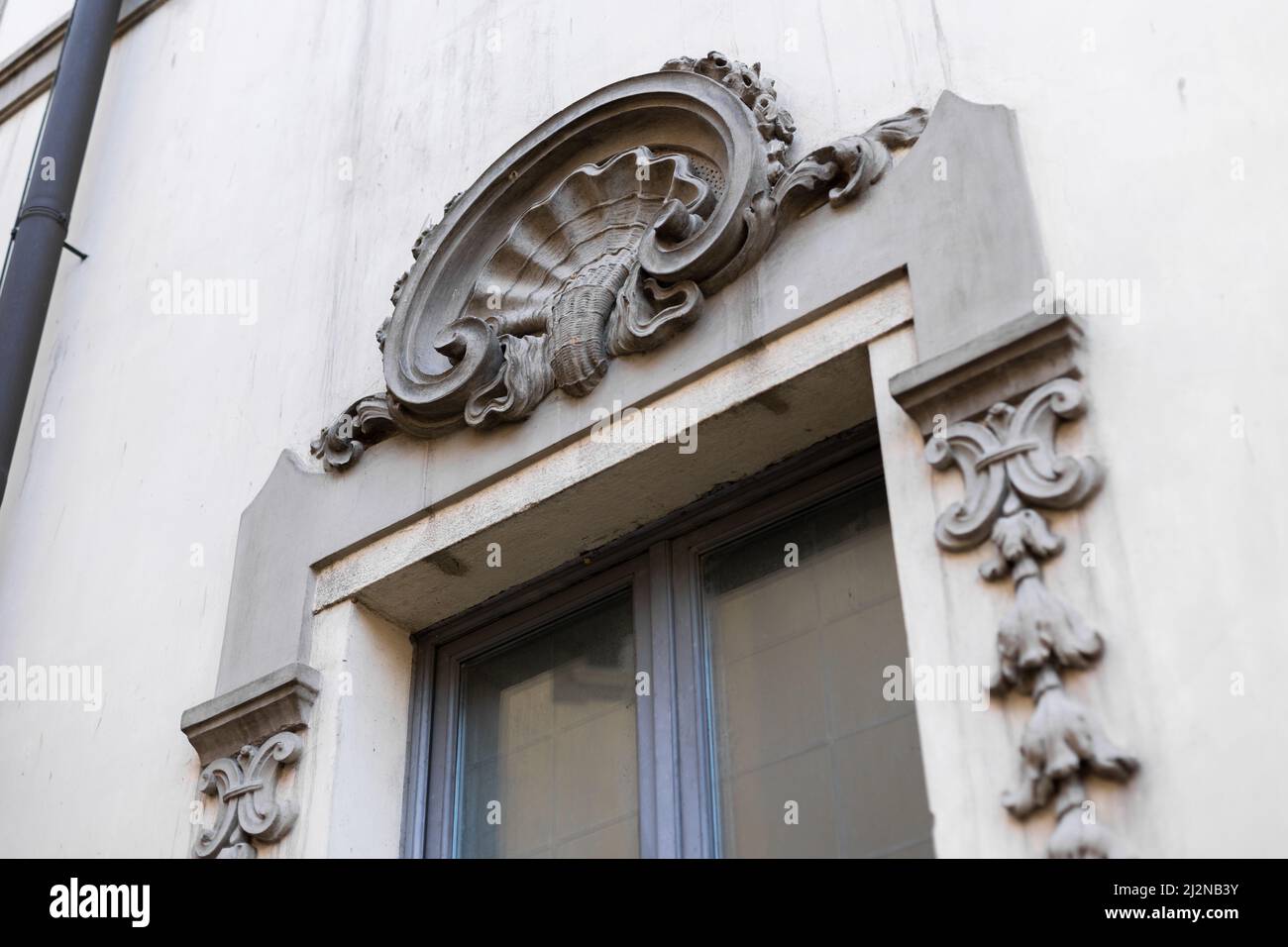 an old vintage window in a beautiful European architecture building ...