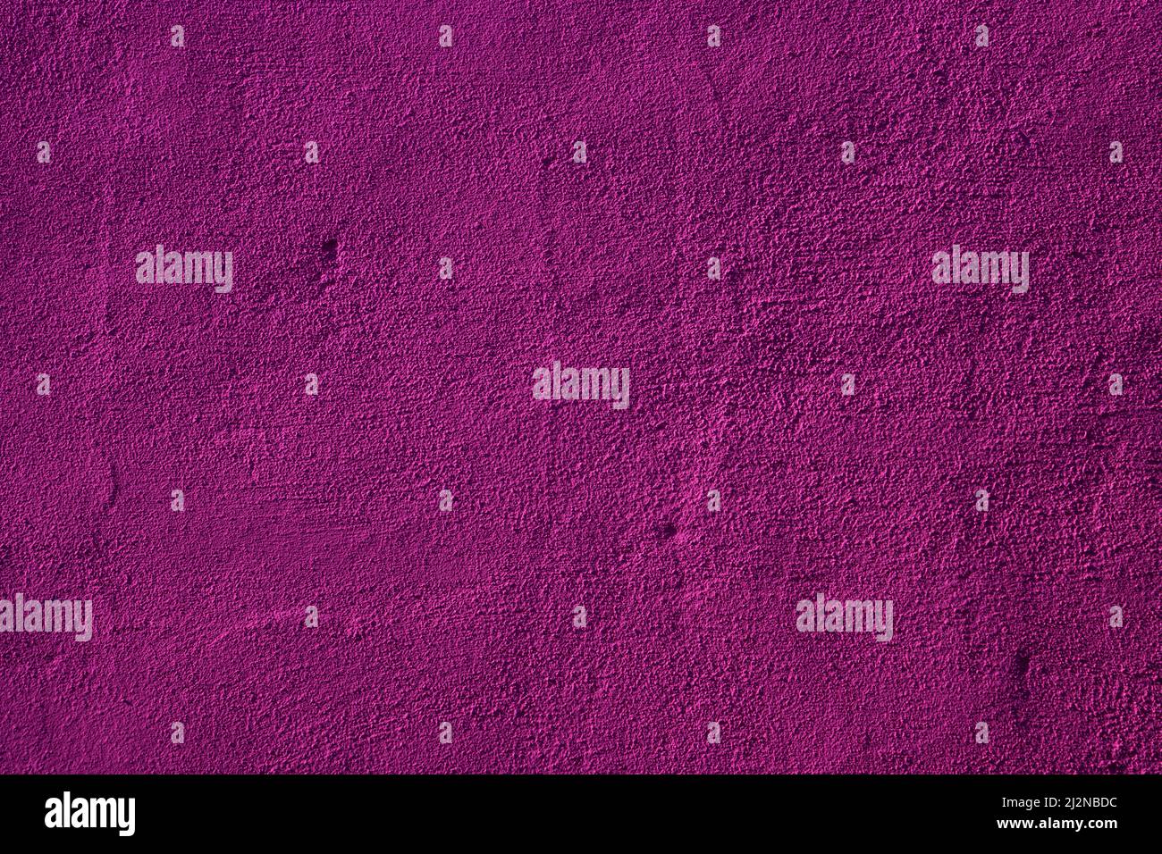 Magenta colored wall texture background with textures of different ...