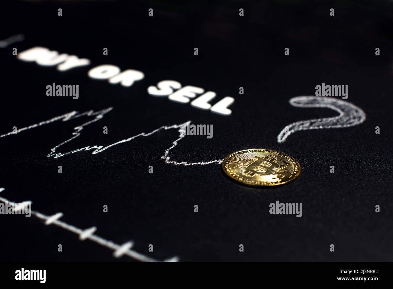 Bitcoin graphic with arrow up and text " Buy or sell" with question ...