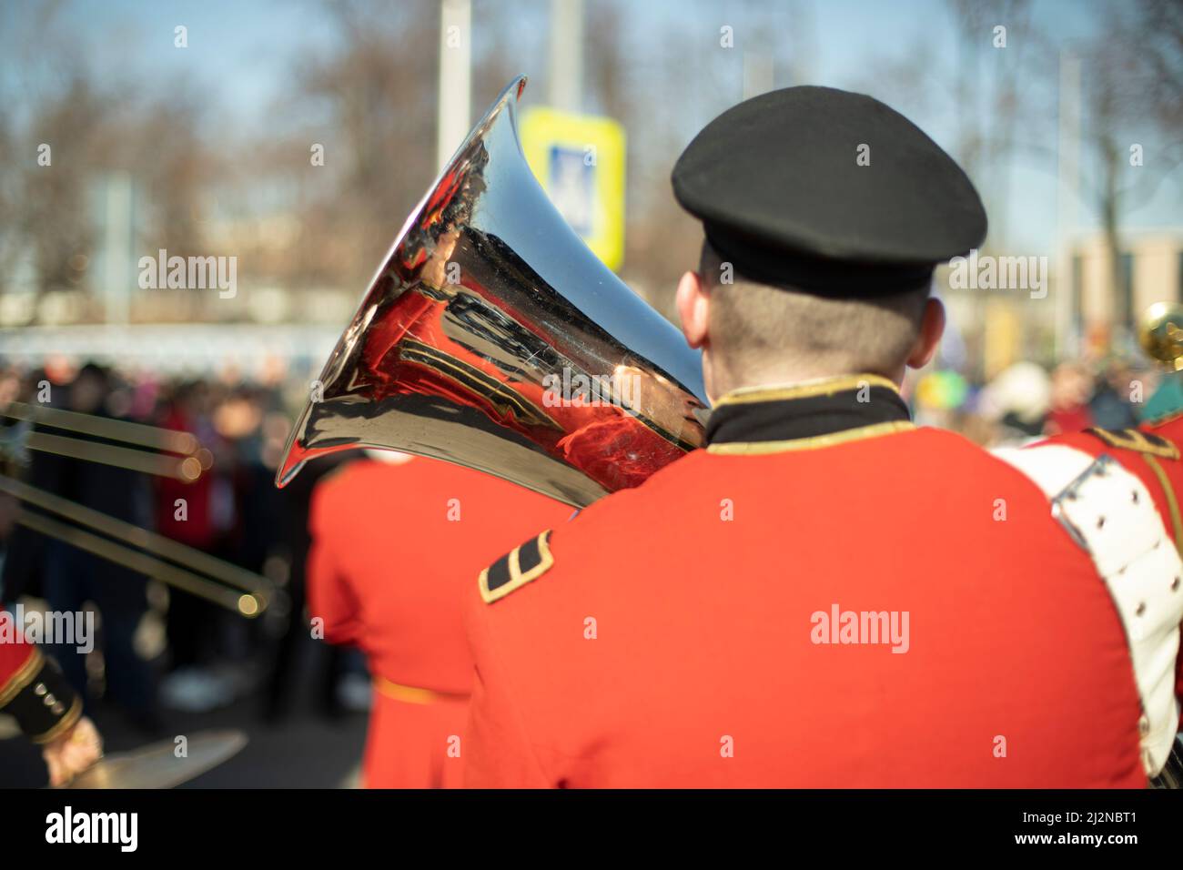 Military band in parade. Trumpeters on street. Trumpeter plays tune ...