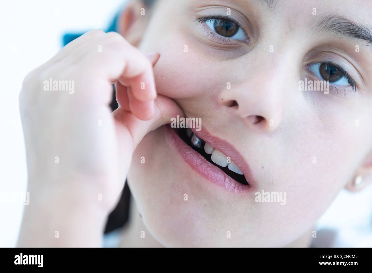 little girl showing her healthy teeth at dental office, smiling and ...