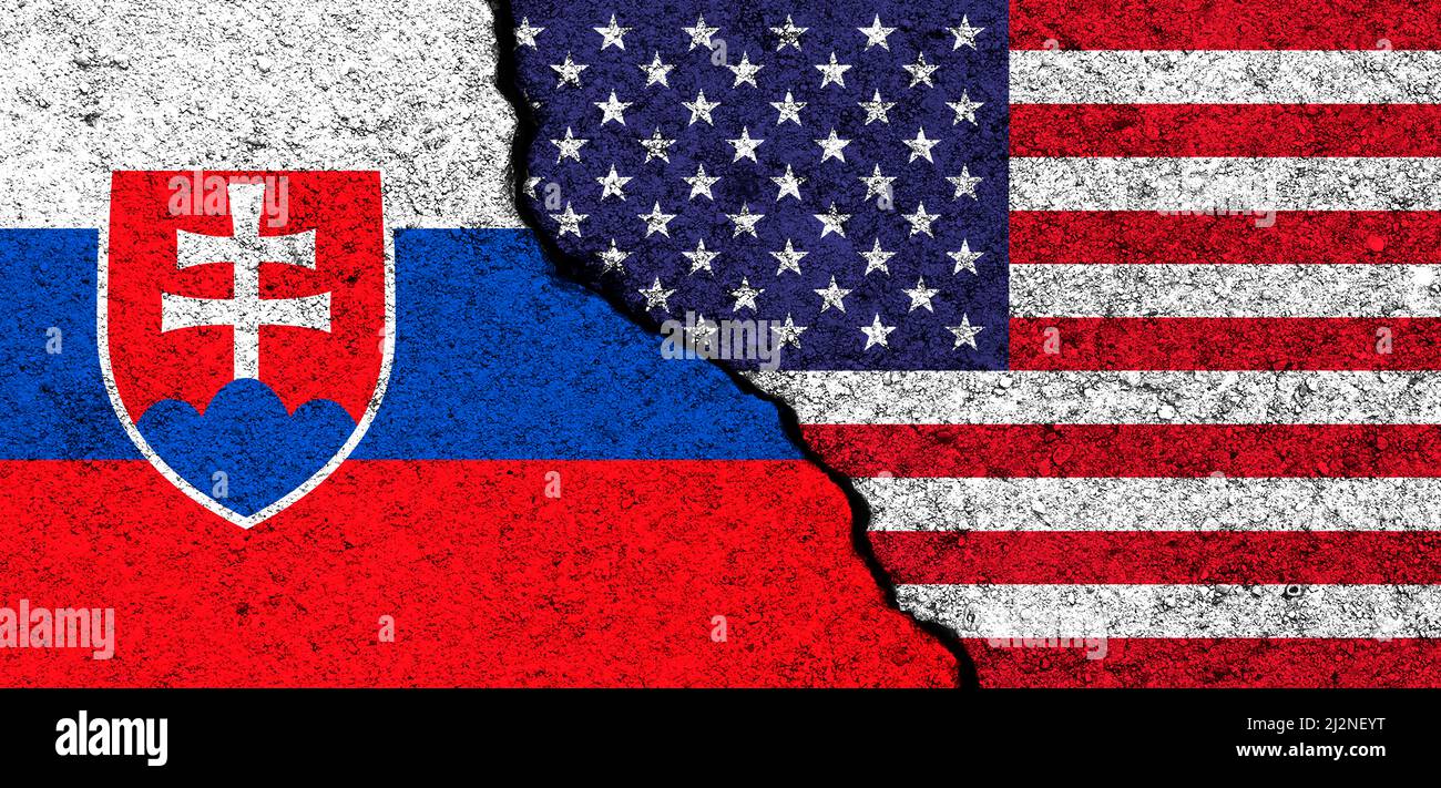 USA and Slovakia. Flags painted on cracked concrete wall. United States ...