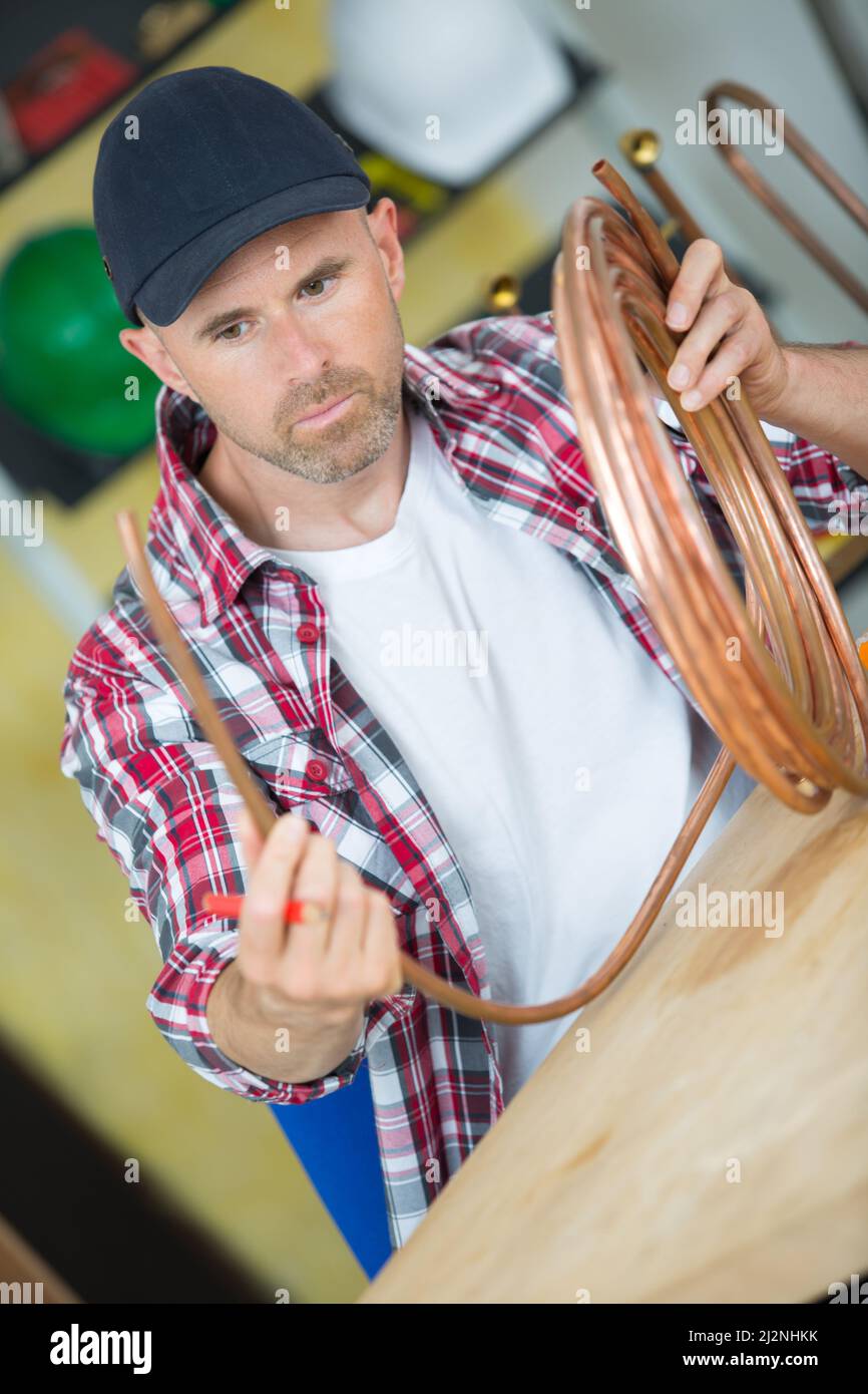 electrician engineer measuring cooper cable Stock Photo - Alamy
