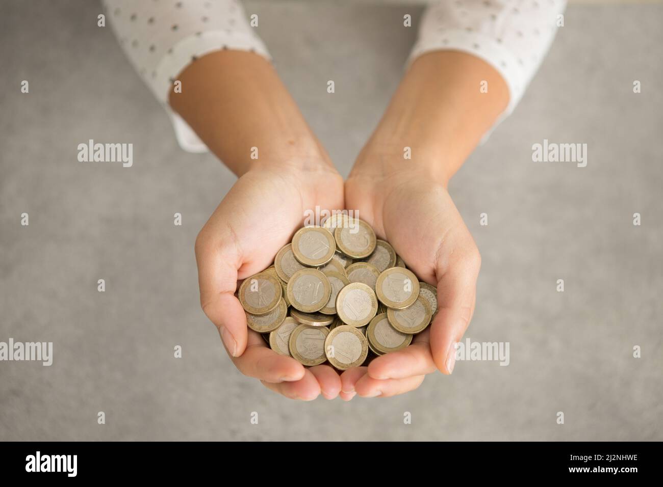 Handful of pennies hi-res stock photography and images - Alamy