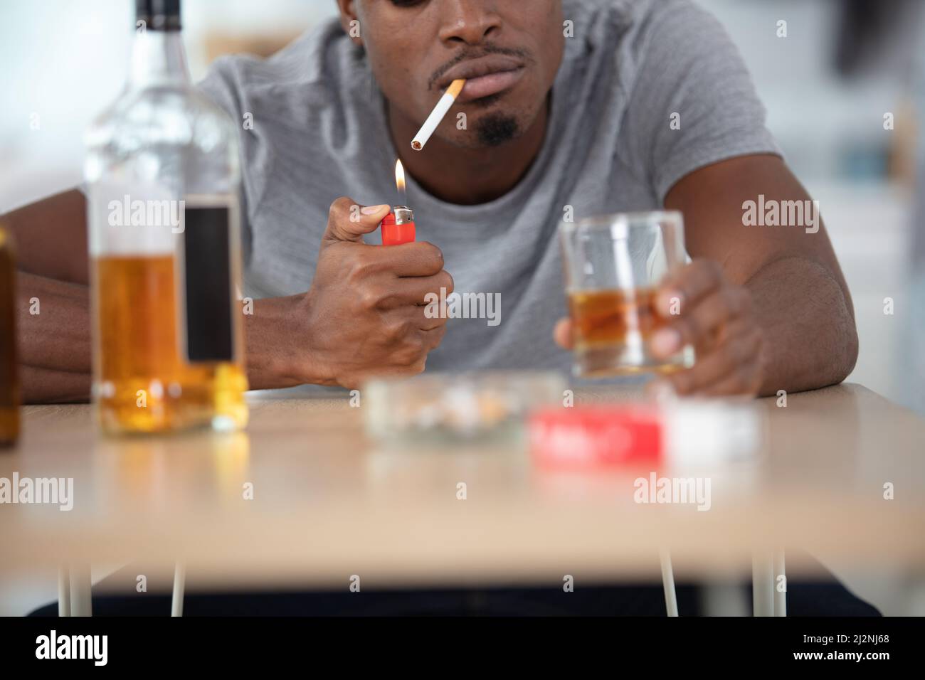 People Drinking Alcohol And Smoking