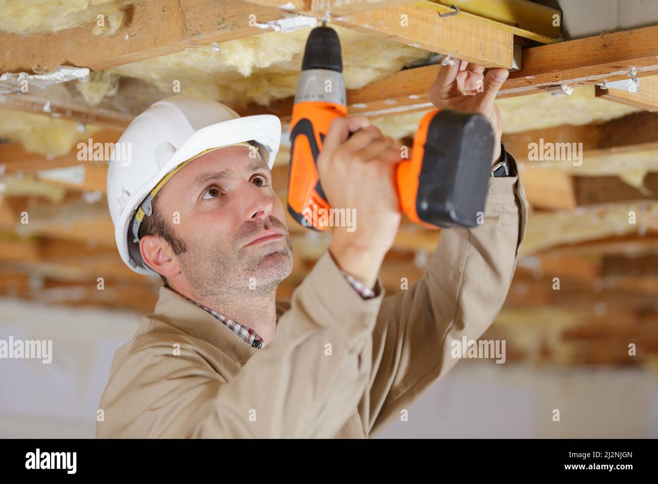 Handy man drilling hi-res stock photography and images - Alamy