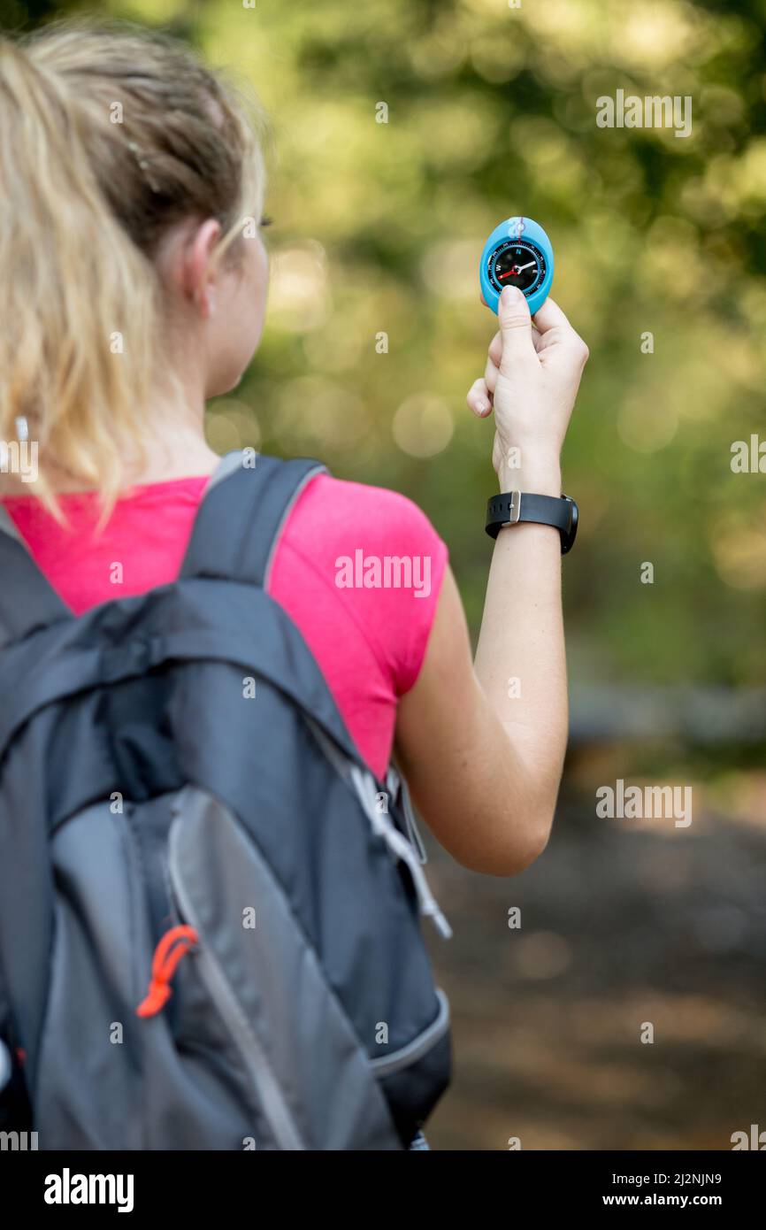 Orienteering compass girl hi-res stock photography and images - Alamy