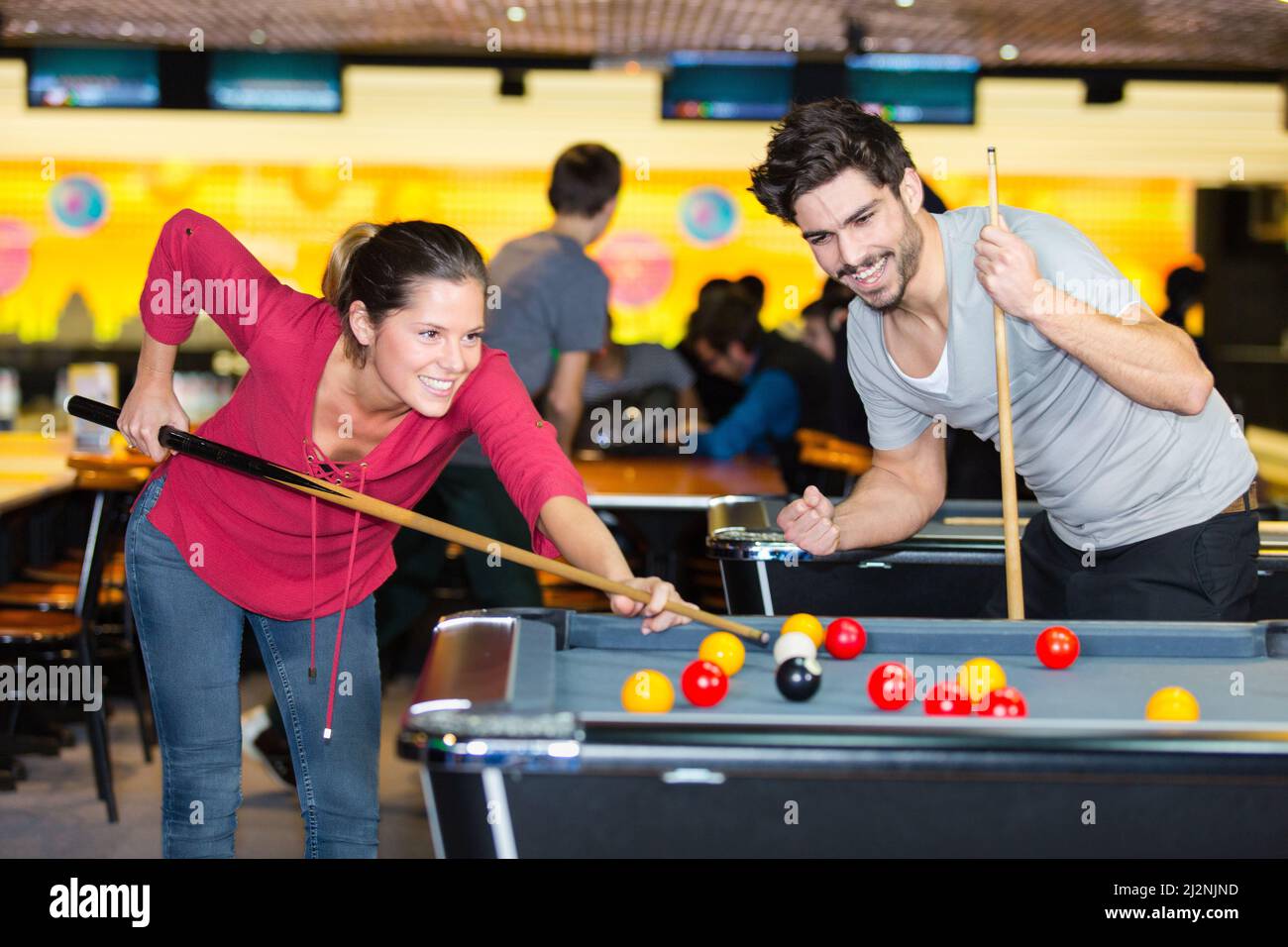 Couple playing by a pool hi-res stock photography and images - Alamy