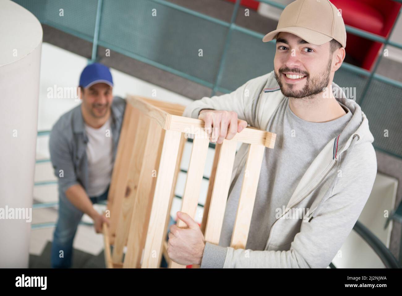 Carrying heavy sofa two hi-res stock photography and images - Alamy