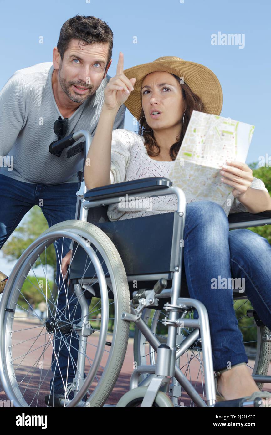 Adult woman in wheelchair checking hi-res stock photography and images ...