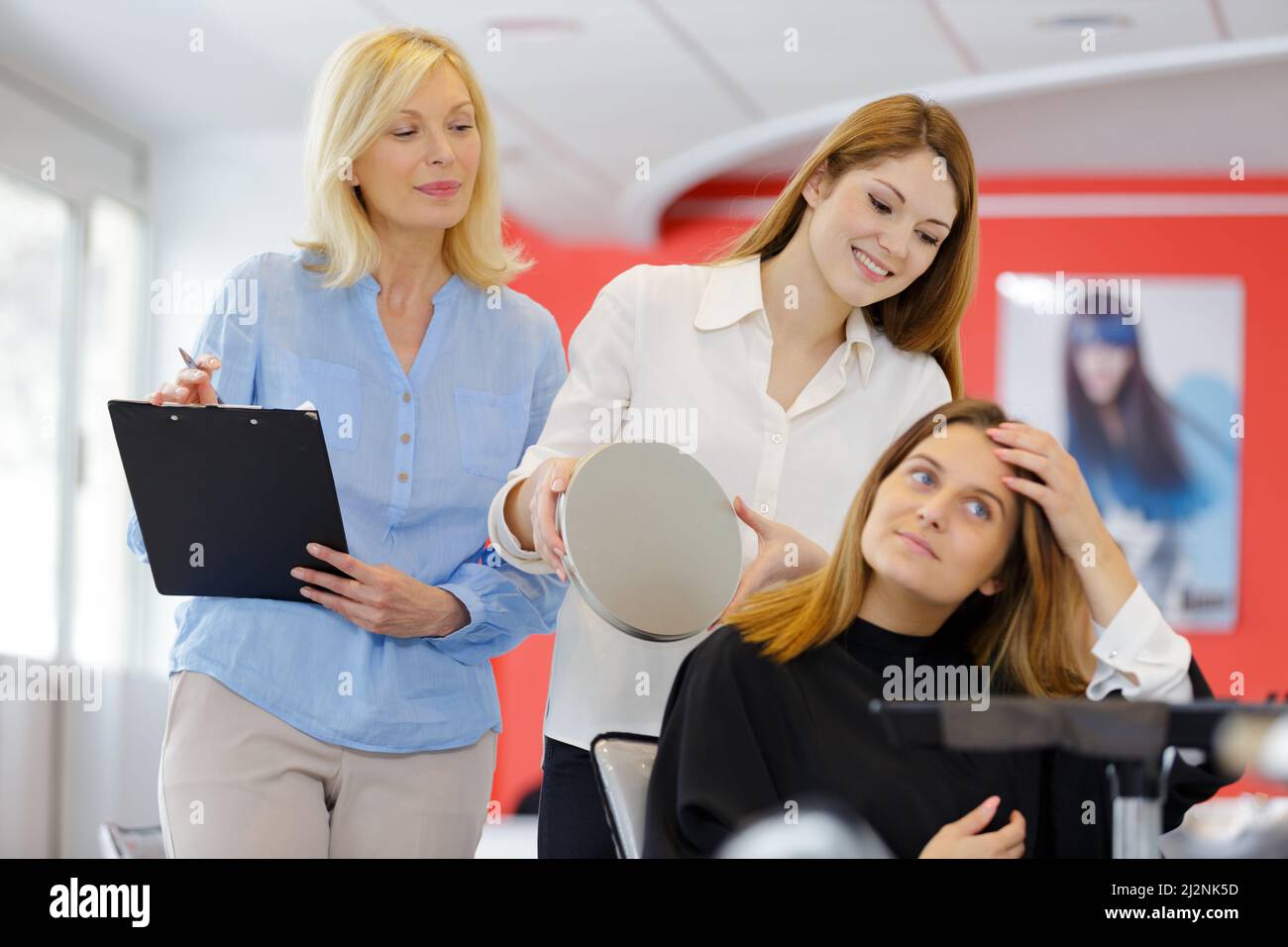 women hairdressers standing in hair and beauty salon Stock Photo - Alamy