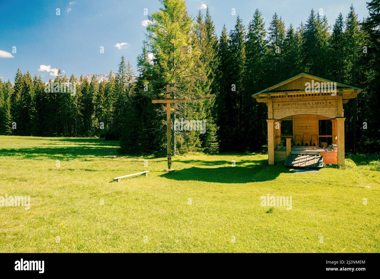wooden cross in mountain landscape Stock Photo - Alamy